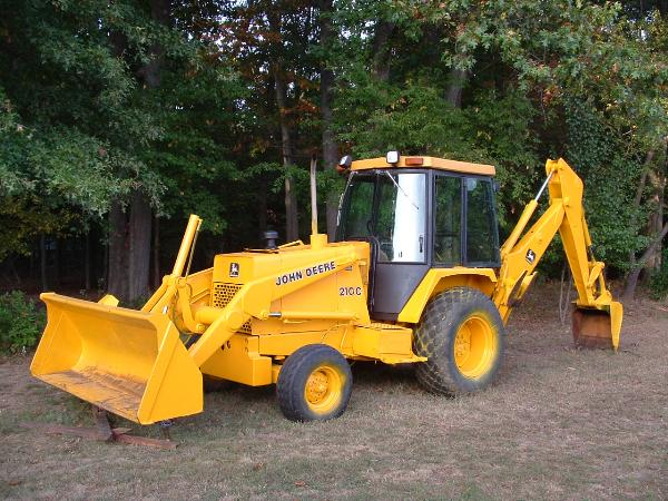 Transport a 1990 John Deere 210-c loader/backhoe to Gwinn | uShip