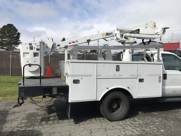 Cost to Ship a Altec man lift and 9' service body AT235 to Edmonton | uShip